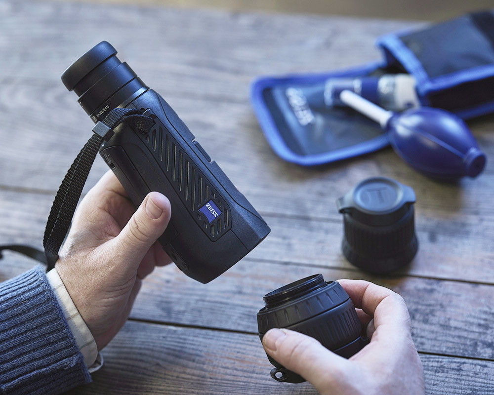 How do I change the lens on a DTI 6 thermal imaging camera?